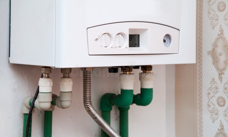 White boiler on the wall stock image. Image of engineering - 65175835