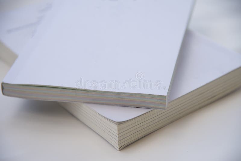 White book on white table stock image. Image of knowledge - 258508595