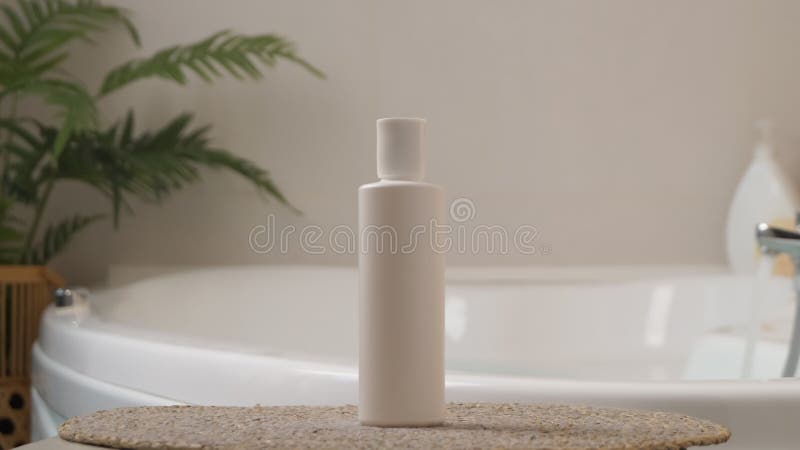 White Bottle of Bubble Bath on Tub Indoors Stock Photo - Image of ...