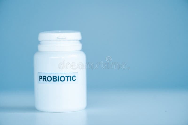 White Bottle with Probiotic Lettering on Blue Stock Photo - Image of ...