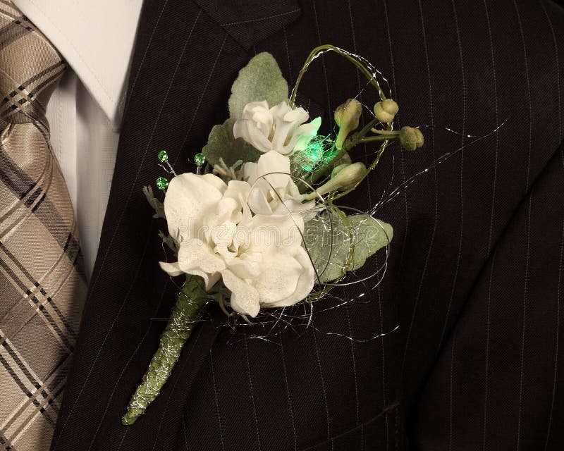 A White Boutineer or Boutonniere on a Mans Lapel Stock Image - Image of ...