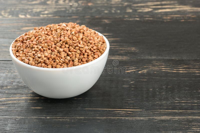 Buckwheat in a bowl stock image. Image of dark, nature - 112404341