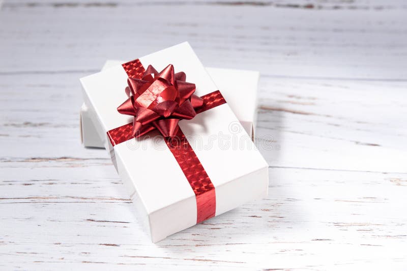 White Box with a Bow on a Light Background Stock Image - Image of cell ...