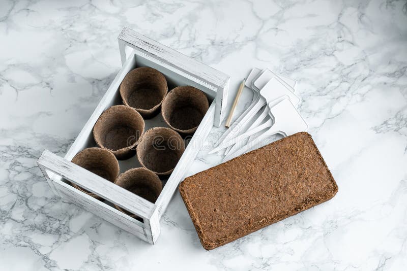 A White Box with Peat Pots, Coconut Briquettes, and Nameplates. Stock ...