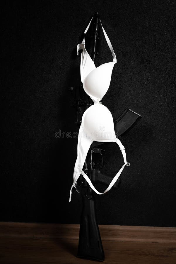 Weapon and bra stock image. Image of sexuality, sensuality - 260068877