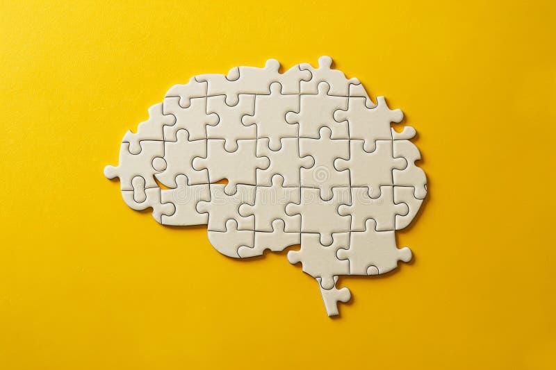 White Brain Shaped Jigsaw Puzzle on Yellow Background Symbolizing ...