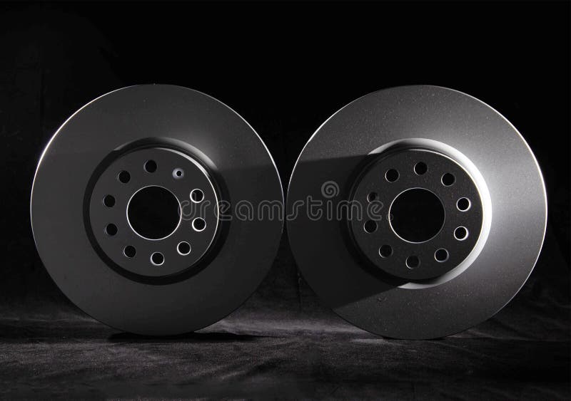 Car Brake Discs on a Black Background, Isolate. Disc Brake System ...