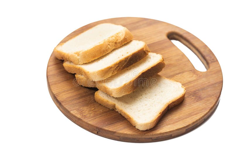 White Bread Toast Slices on the Wooden Cutting Board Stock Photo ...