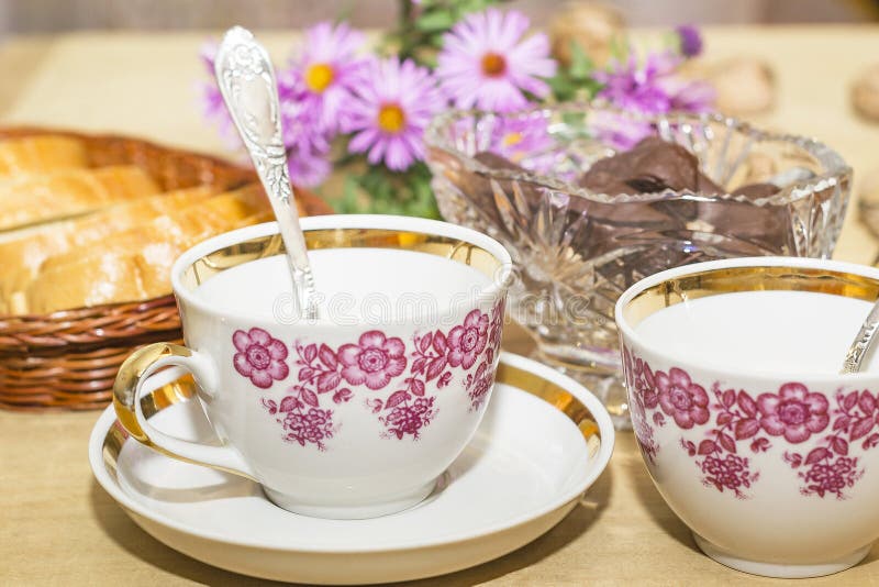 White Bread and Two Teacups on a Wooden Table Stock Image - Image of ...
