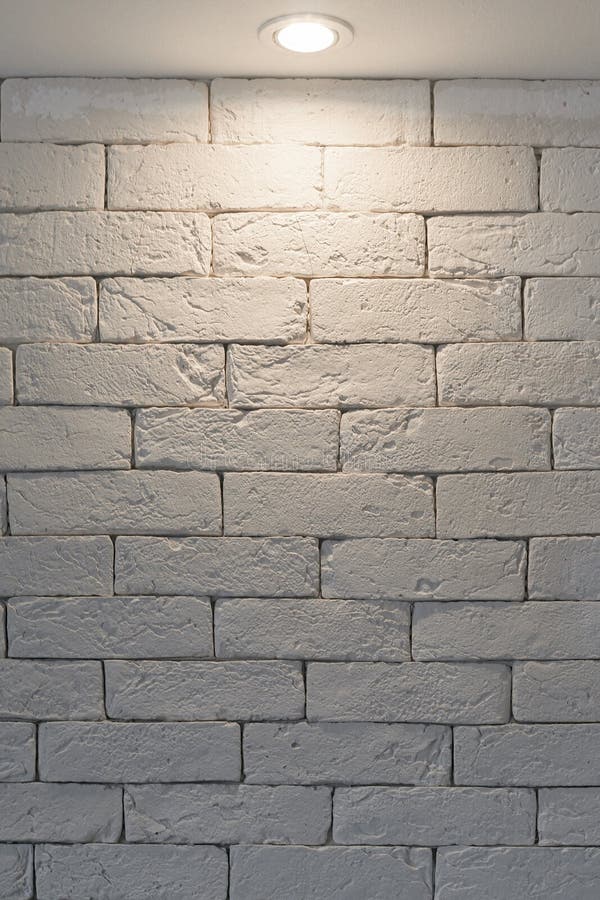White Brick Wall Lit by a Lamp Stock Photo - Image of concrete ...