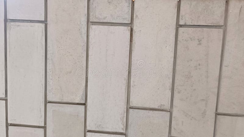 A White Brick Wall with a Pattern of Squares Stock Photo - Image of ...