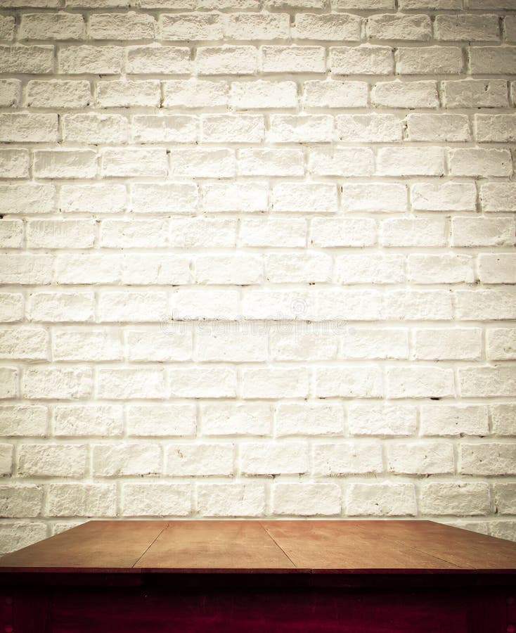 White Brick Wall and Wooden Table Stock Photo - Image of tabletop ...