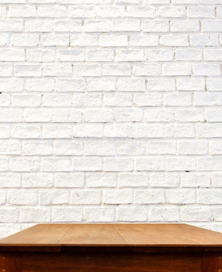 White Brick Wall and Wooden Table Stock Image - Image of room ...