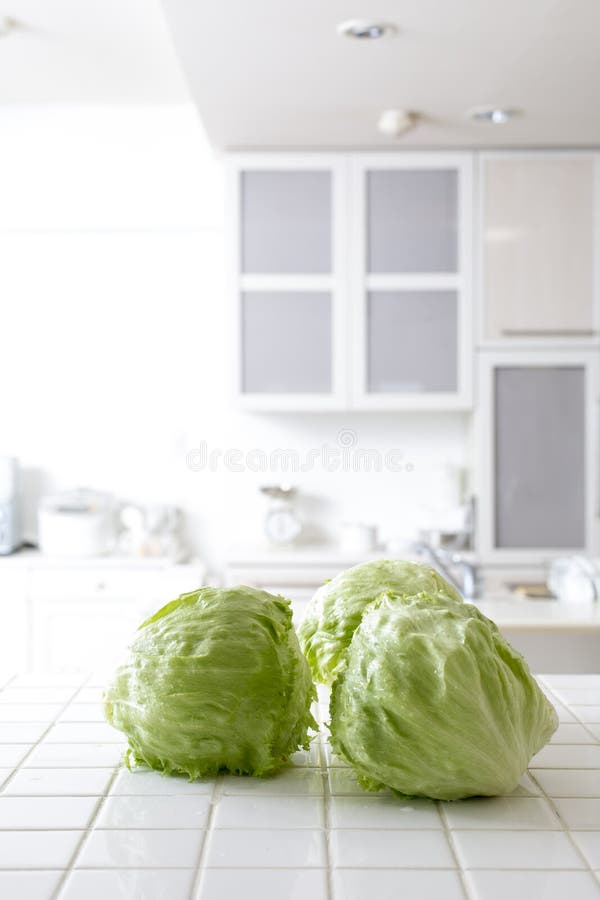 Background of the Kitchen with Lettuce, Stock Photo - Image of counter ...