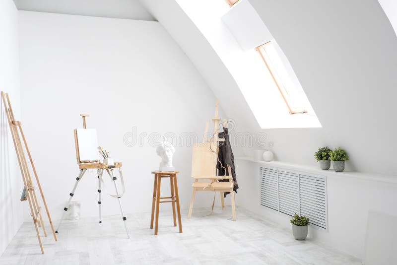 White and Bright Studio with a Window. Workspace of the Artist. Easel ...