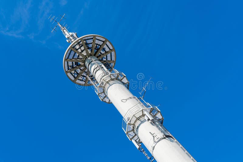 White Broadcasting Tower Against the Blue Sky Stock Photo - Image of ...