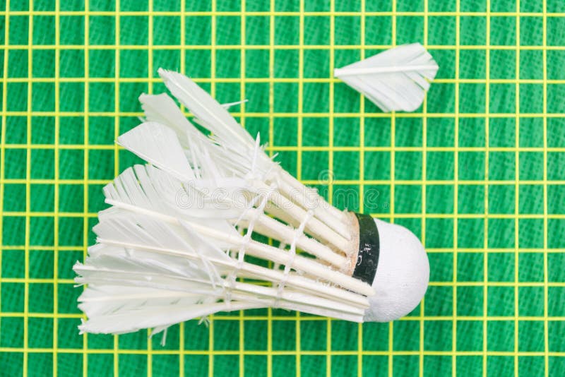 White Broken Shuttlecock on Yellow Racket Net Stock Image - Image of ...