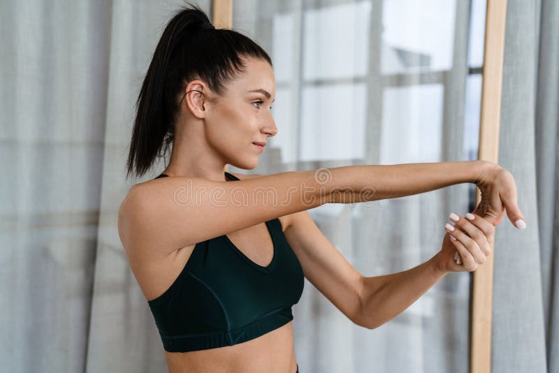 White Brunette Woman Doing Exercise while Working Out Stock Image - Image of white, stretch ...