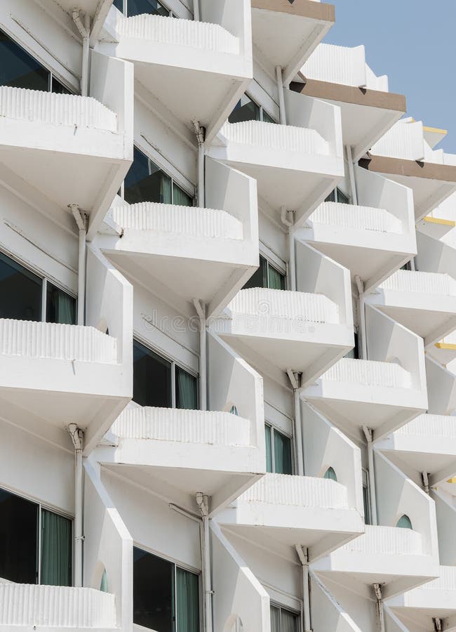 White Building Hotel with Pattern Window Block Design Stock Photo ...