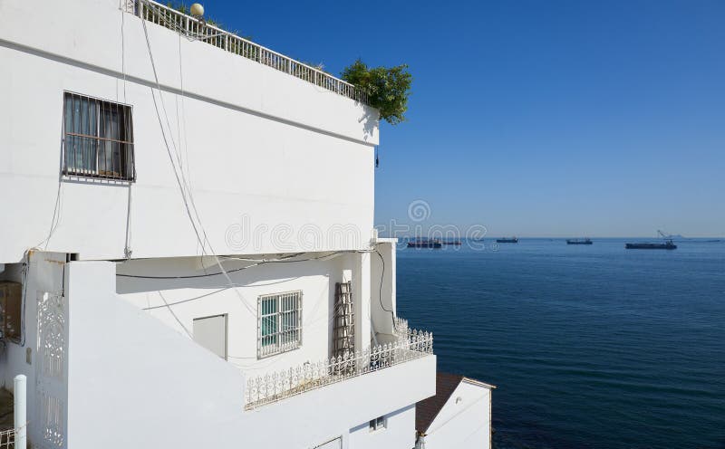 White Building Overlooking Cargo Ships in Busan, South Korea Stock ...