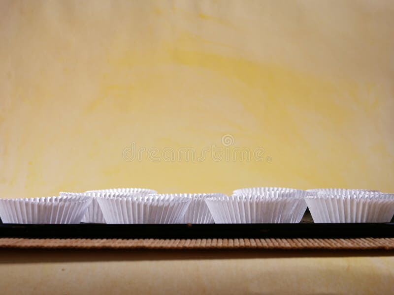 White Bun Cases Baking Yellow Background Stock Photos - Free & Royalty ...