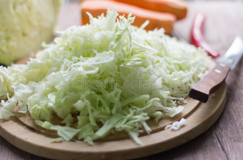 White Cabbage Cut into Strips and Carrots for Cooking Stock Image ...