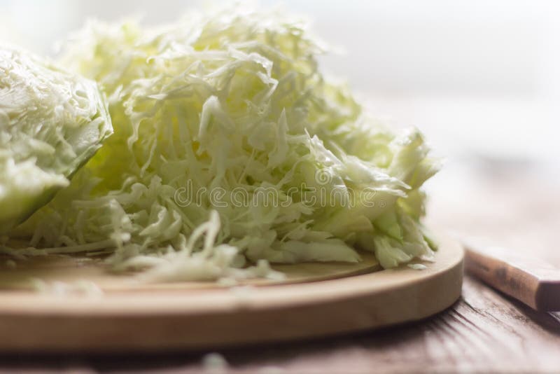 White Cabbage Cut into Strips and Carrots for Cooking Stock Image ...