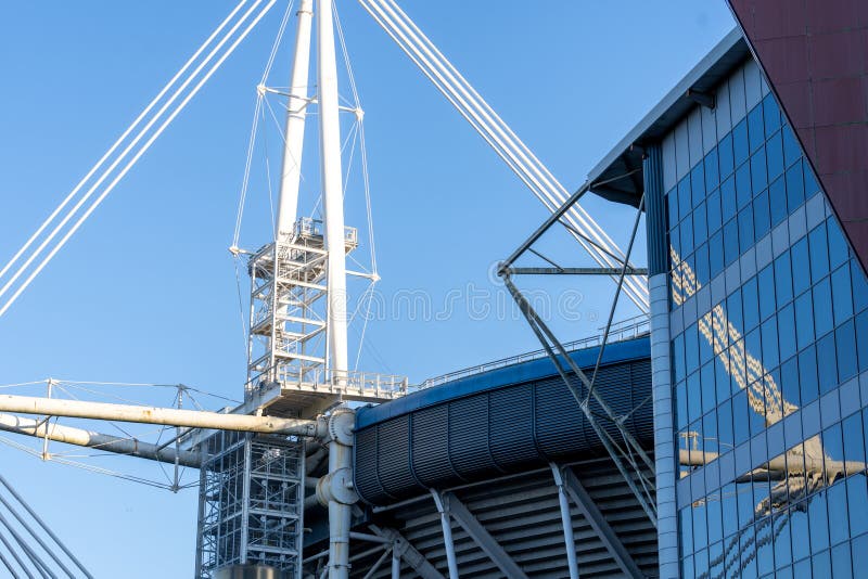 White Cable-stayed Truss Masts Reflected in Widow Behind at the Cardiff ...