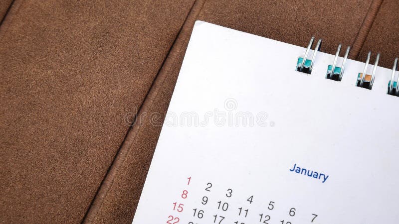 White Calendar on Brown Lather Stock Photo - Image of 2022, page: 255702296