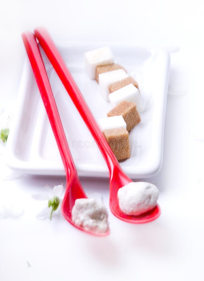 White Candy on the Red Spoon Stock Photo - Image of coffee, garnished ...