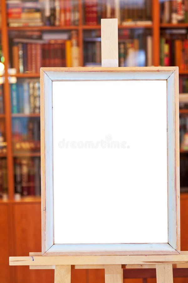 White Canvas of Simple Picture Frame on Easel in Library Stock Photo ...