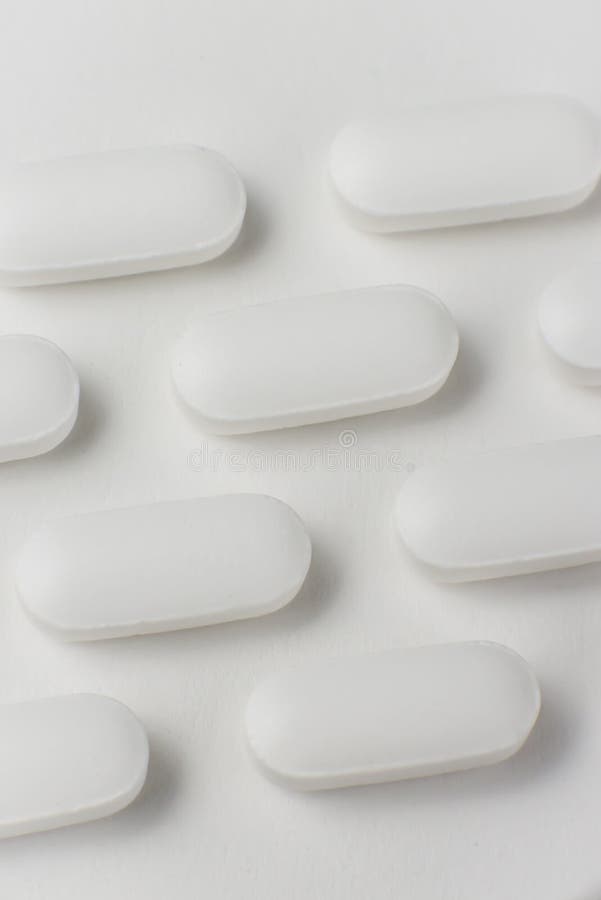 White Caplets Pattern stock photo. Image of line, dose - 38647386