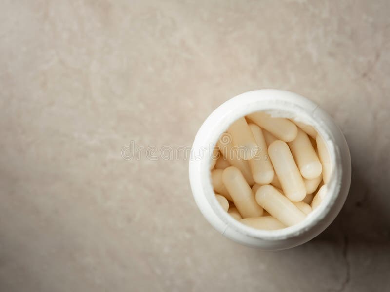 White Capsule Pills in a Case Stock Photo - Image of pills, capsules ...