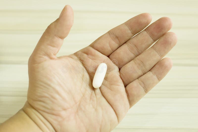 The White Capsules on Hand Image Close Up Stock Image - Image of ...