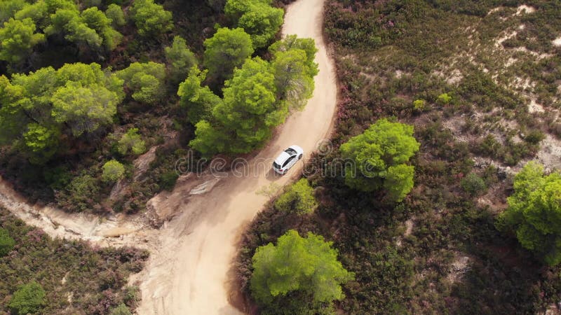 White Car Driving Along the Valley Road Stock Video - Video of driving ...