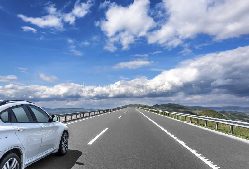White Car is Driving on the High-speed Highway. Stock Photo - Image of ...