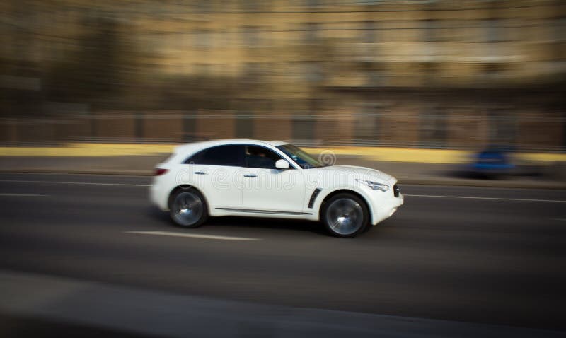 White Car at High Speed in the Road Stock Photo - Image of parking ...