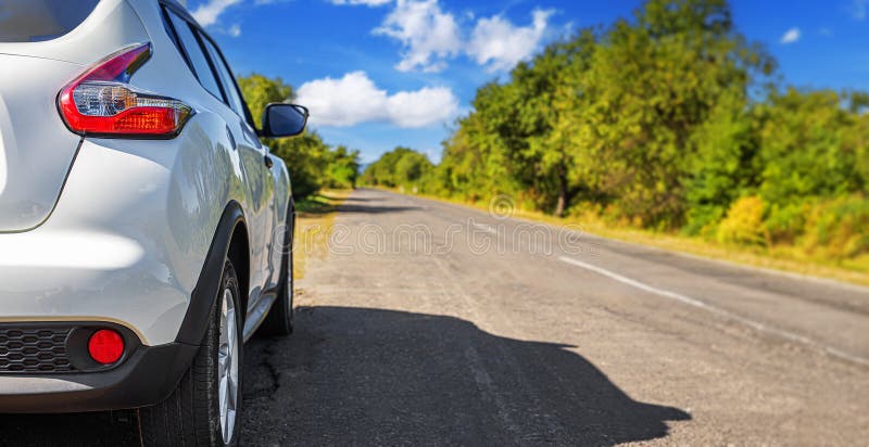 A White Car is Parked on the Side of a Highway. Stock Image - Image of ...