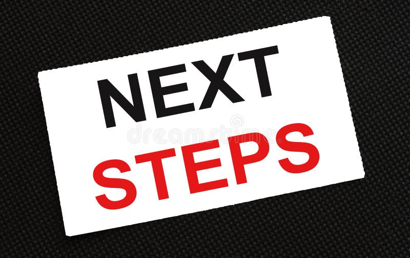 White Card on the Black Background with Text Next Steps Stock Photo ...