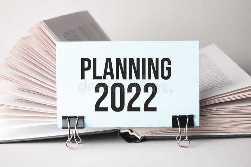 A White Card with the Text Planning 2022 Stands on a Clip for Papers on ...