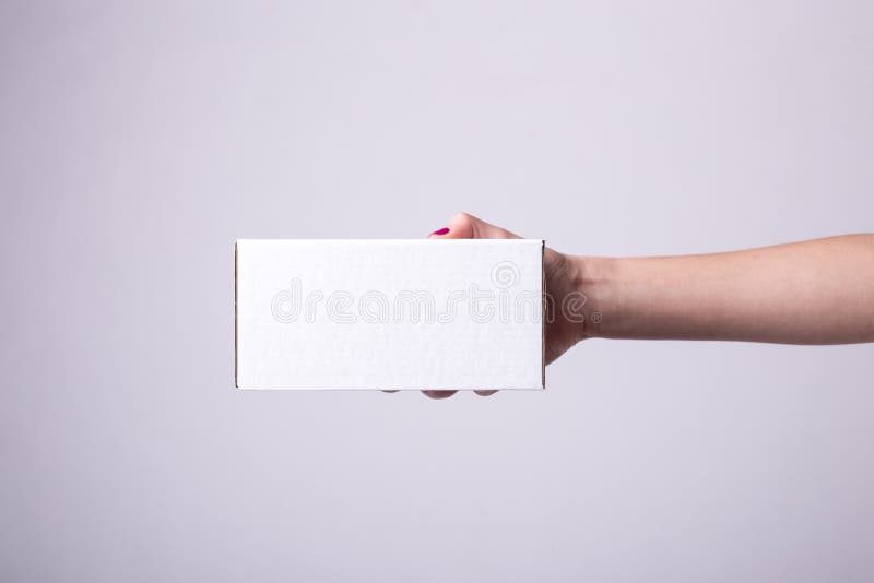 White Cardboard Box in Female Hands. Side View, Delivery, Package ...