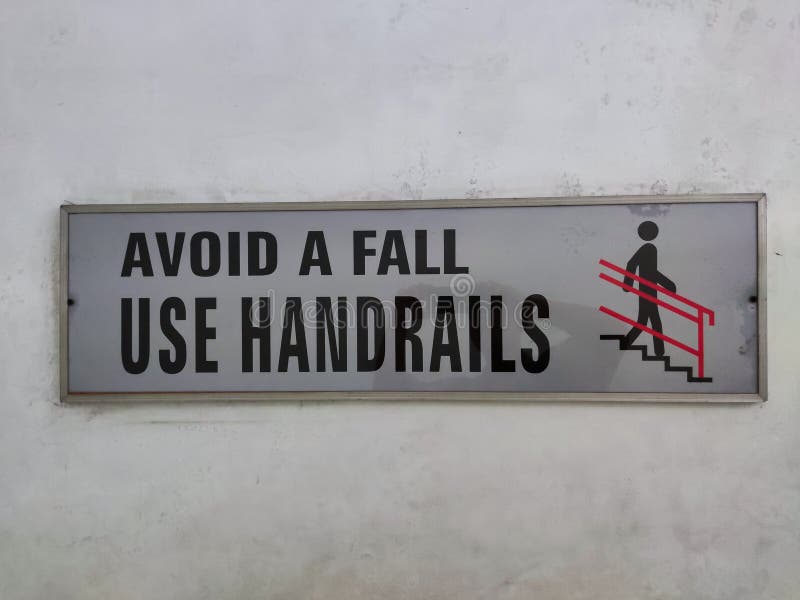 White Caution Sign Board Using Handrails To Avoid Fall when Down the ...