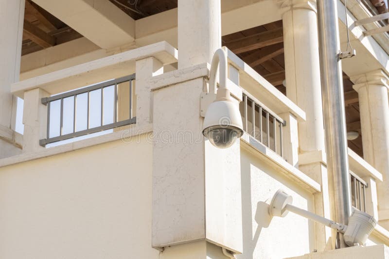 White CCTV Cameras on the Wall of the Building. Stock Image - Image of ...