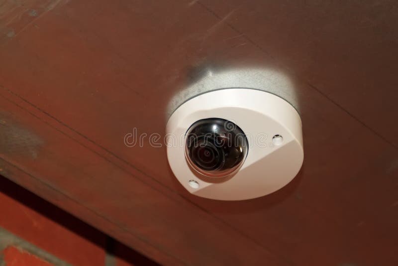White CCTV Surveillance Camera Mounted on Ceiling of Building Stock ...