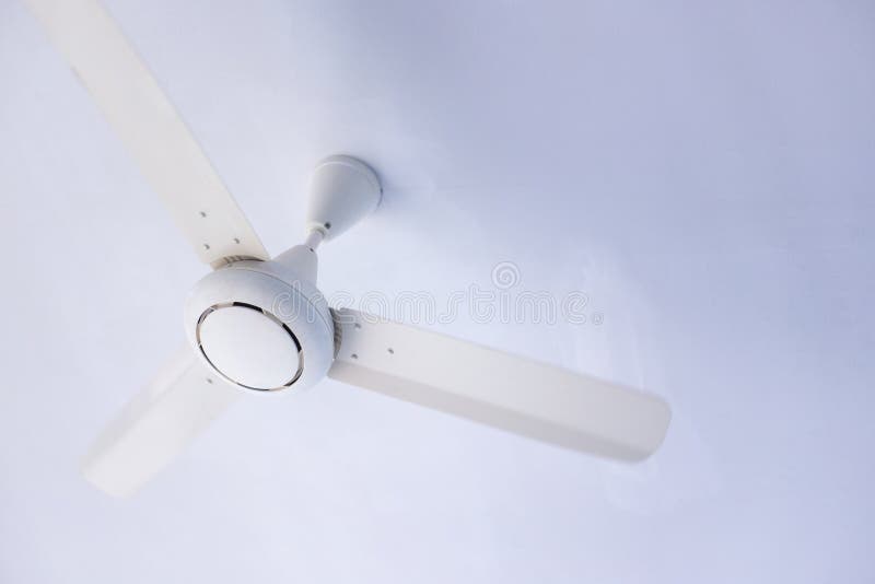 White Ceiling Fan on a White Ceiling Stock Image - Image of interior ...