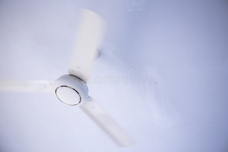 White Ceiling Fan on a White Ceiling Stock Photo - Image of interior ...