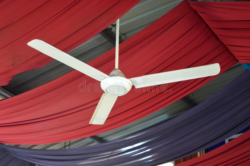 White Ceiling Fan Hanging Under the Roof Stock Photo - Image of ...
