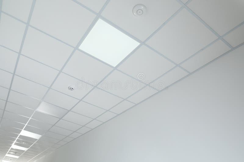 White Ceiling with Modern Lighting in Room, Low Angle View Stock Photo ...