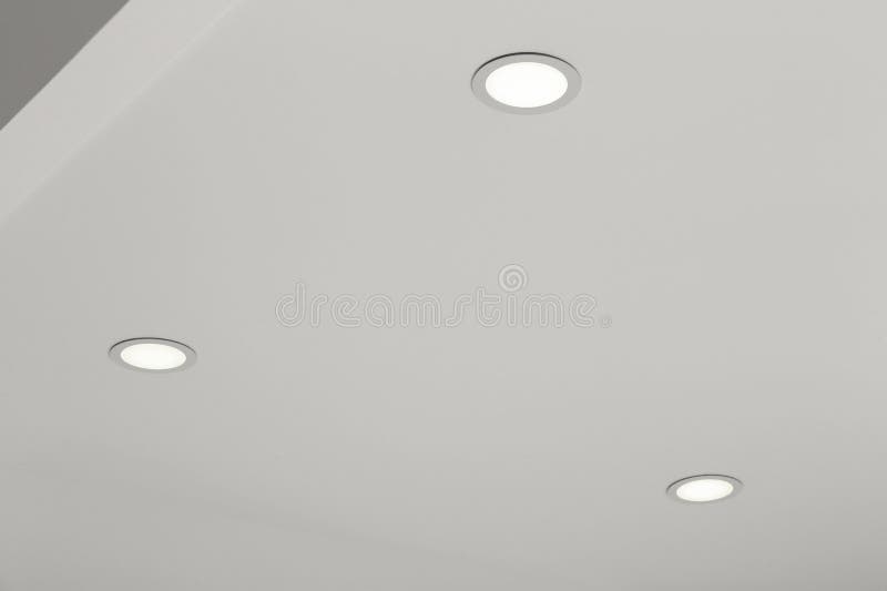 White Ceiling with Modern Lighting in Room, Low Angle View Stock Photo ...