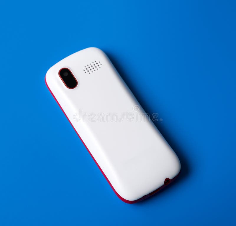 White Cell Phone on Blue Background. Rear View. Stock Photo - Image of ...